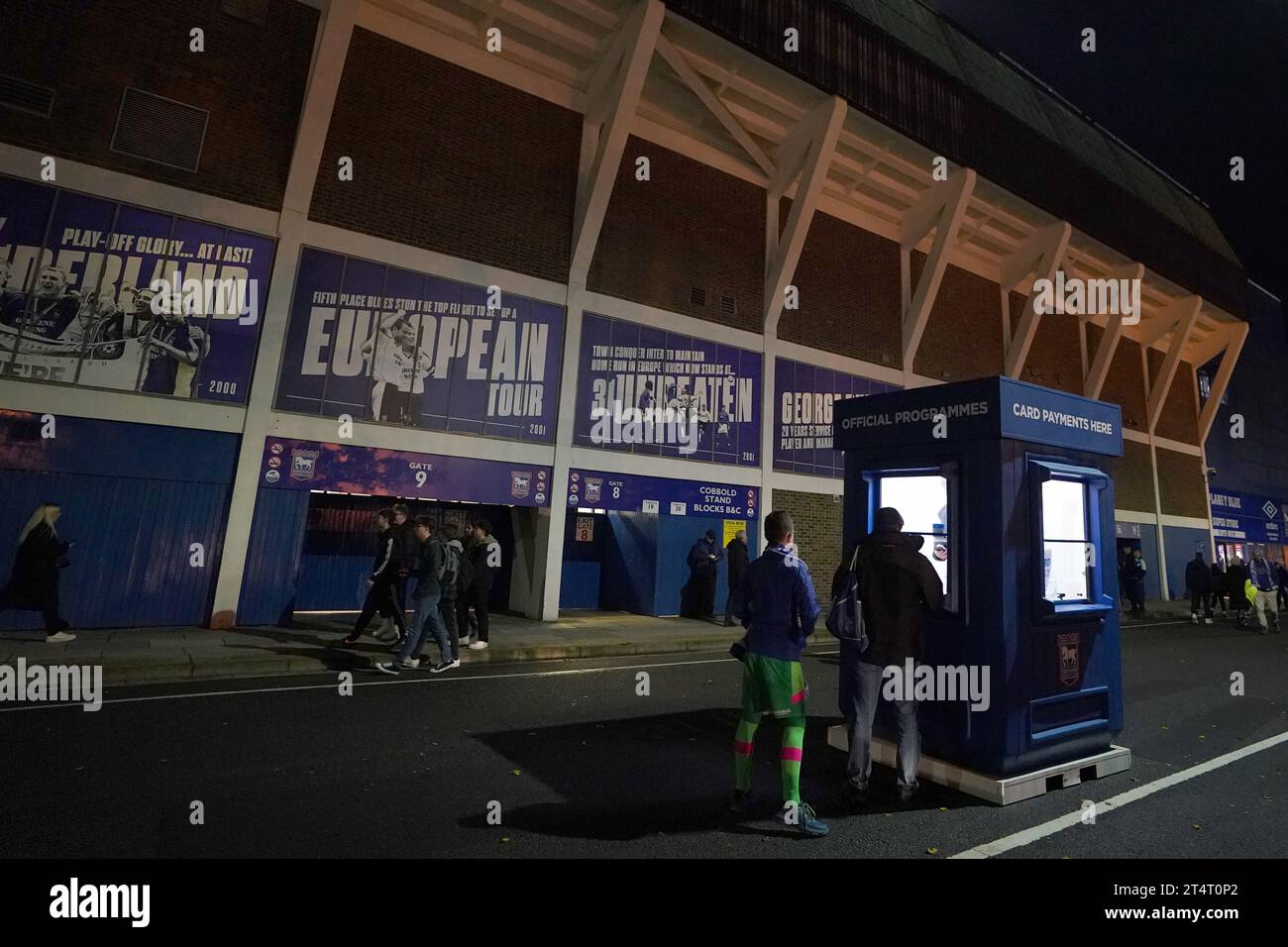 A general view outside the ground as fans queue for a programme ahead ...