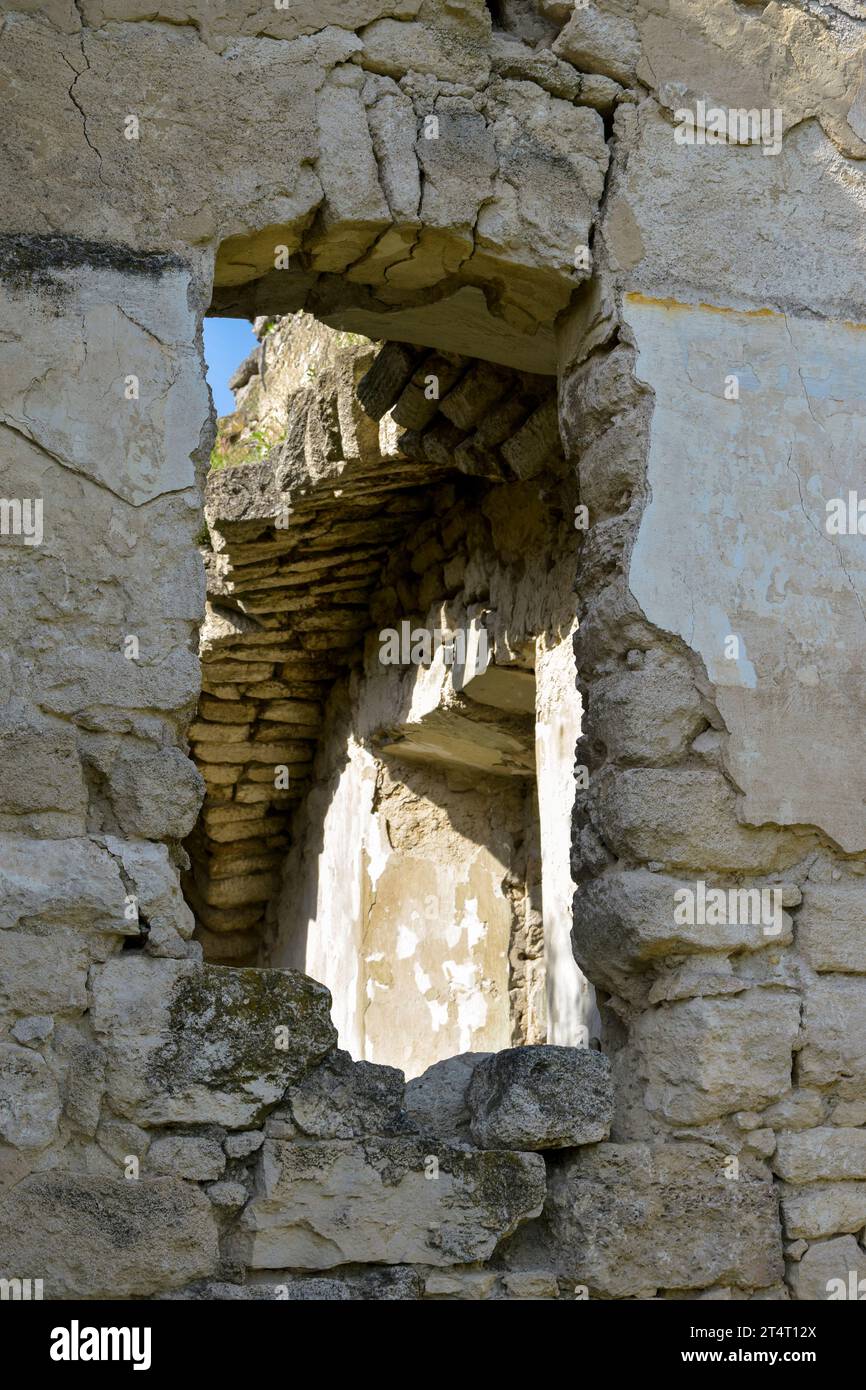 Ruins of ancient stone building with arch windows. Texture of old ...