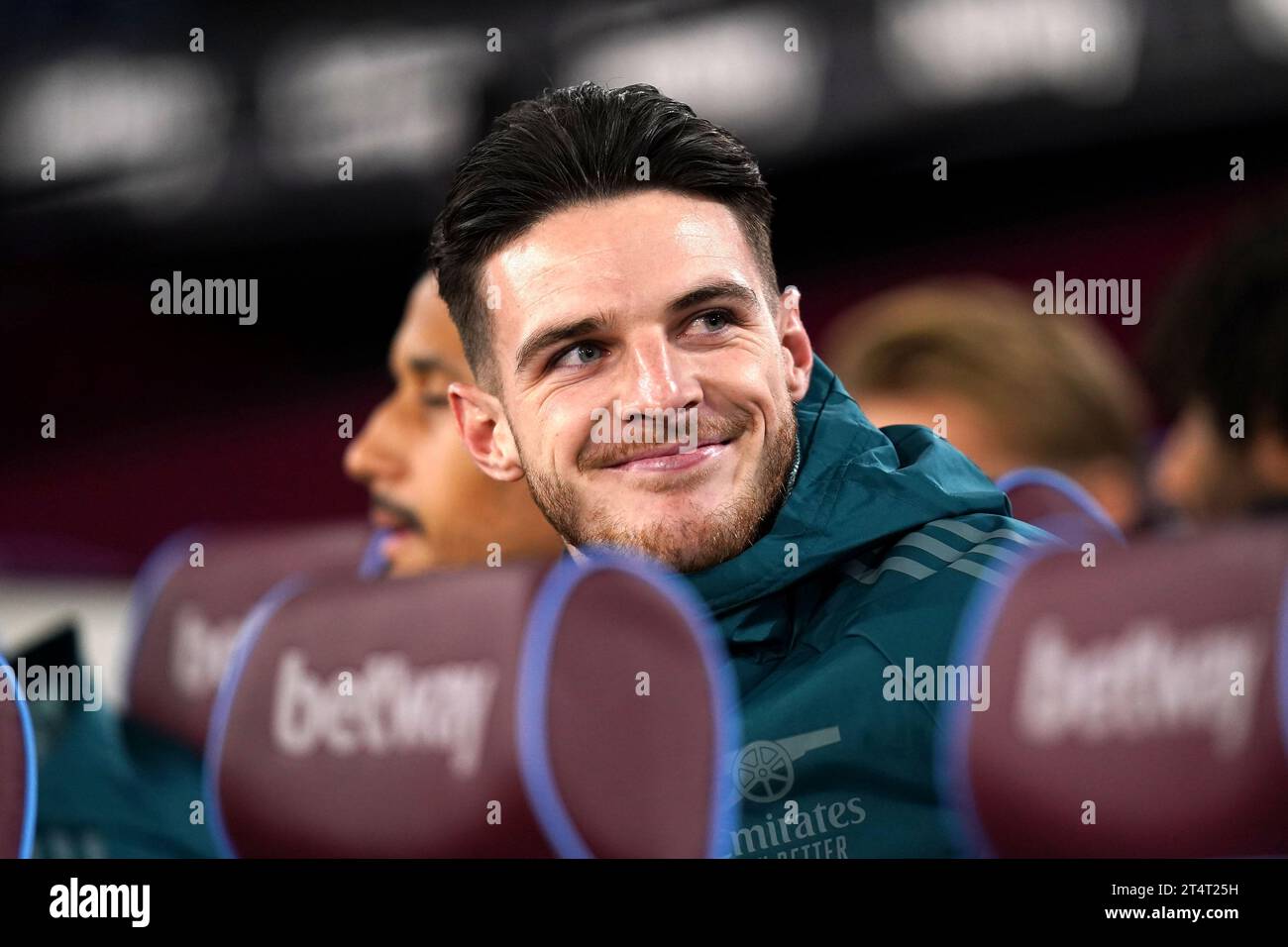 Arsenal's Declan Rice acknowledges the fans while sat on the bench ...