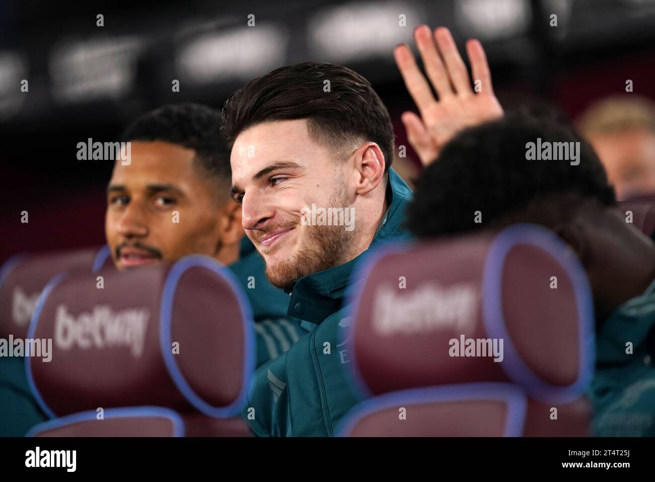Arsenal's Declan Rice acknowledges the fans while sat on the bench ...