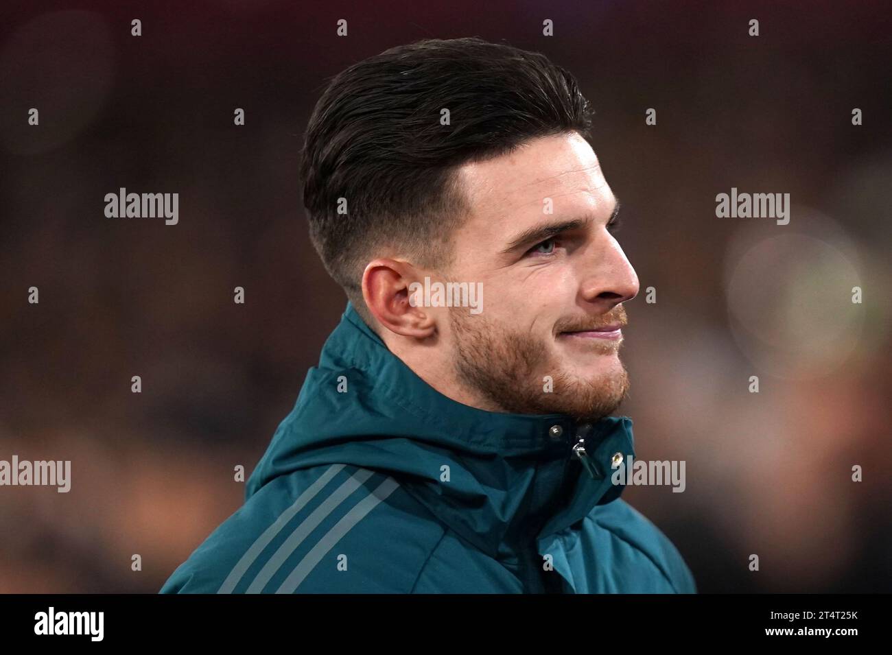 Arsenal's Declan Rice acknowledges the fans while sat on the bench ...