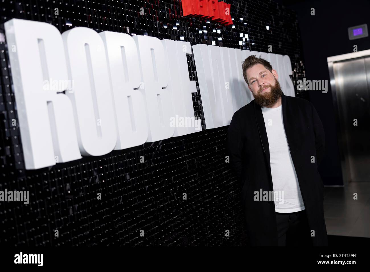 Director Joe Pearlman poses for photographers upon arrival at the ...