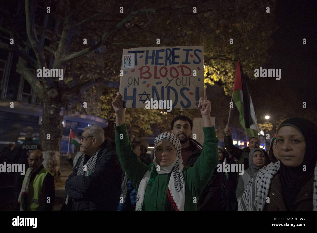 November 1, 2023, Berlin, Germany: In Berlin, a young girl wearing a ...