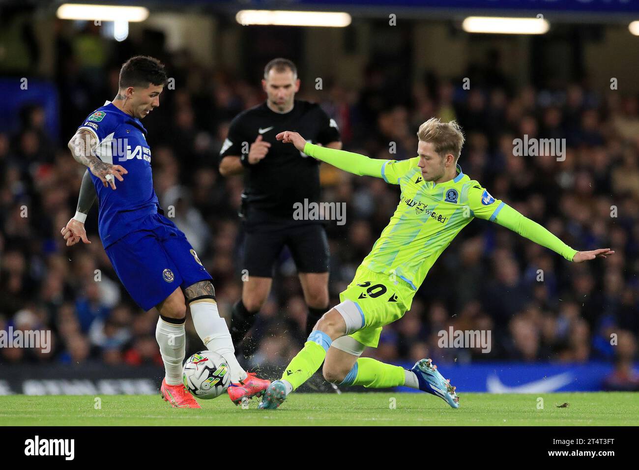 London, UK. 01st Nov, 2023. Enzo Fernández of Chelsea is tackled by ...