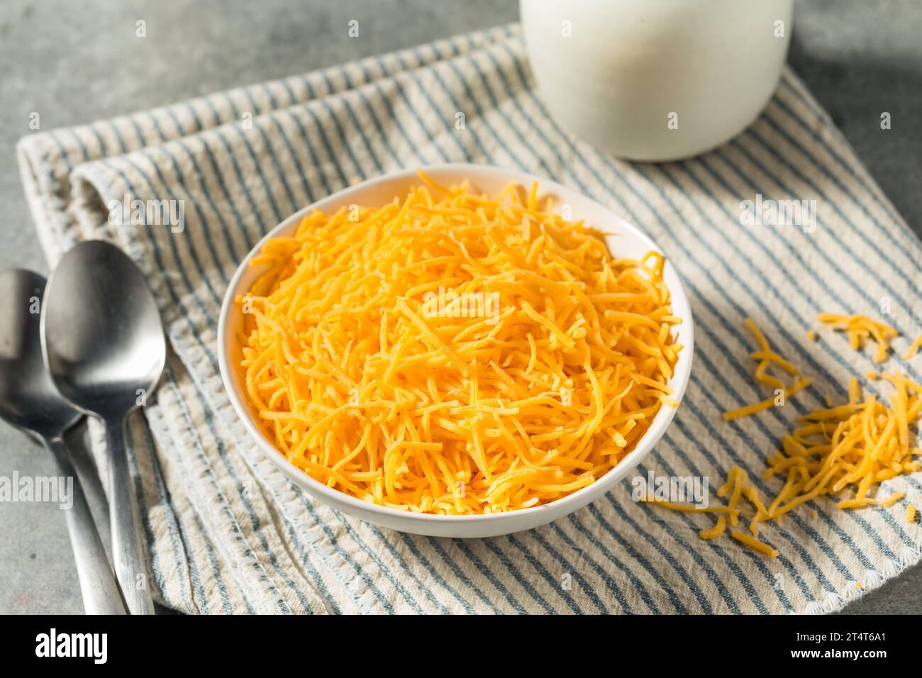Organic raw shredded cheddar hi-res stock photography and images - Alamy