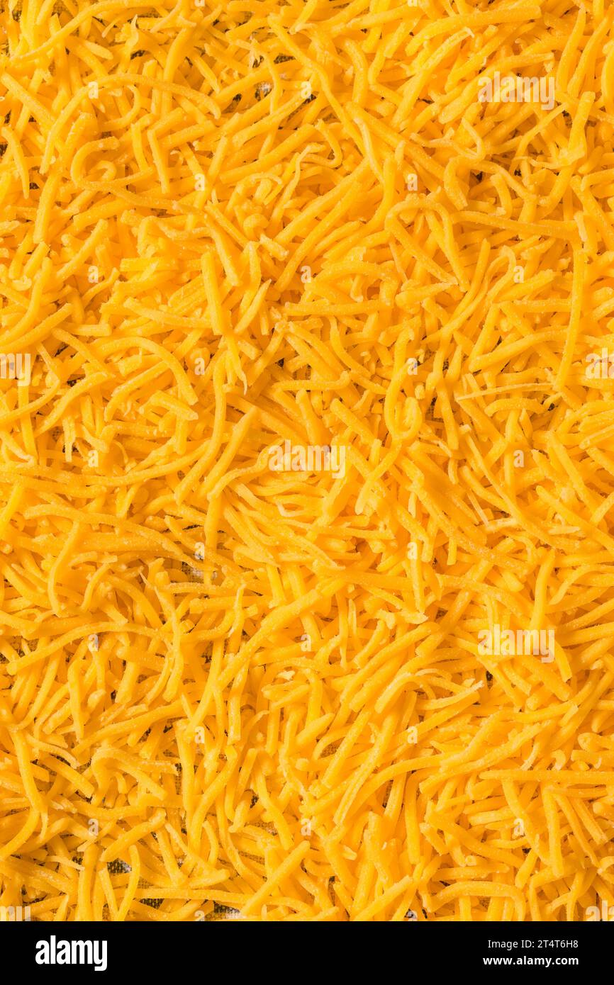 Organic raw shredded cheddar hi-res stock photography and images - Alamy