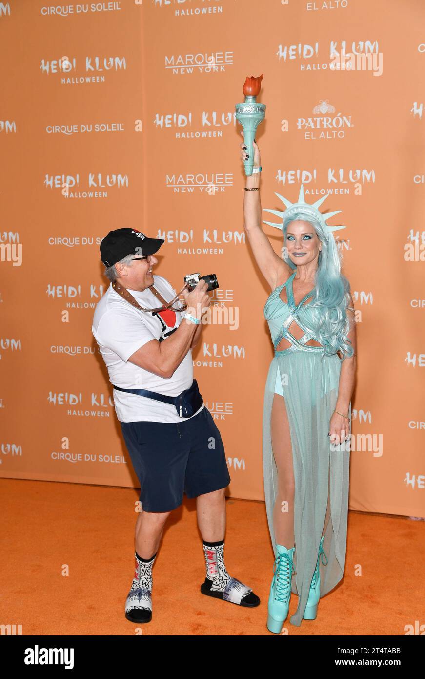Kevin Mazur, left, and wife Jennifer Mazur attend Heidi Klum's 22nd ...