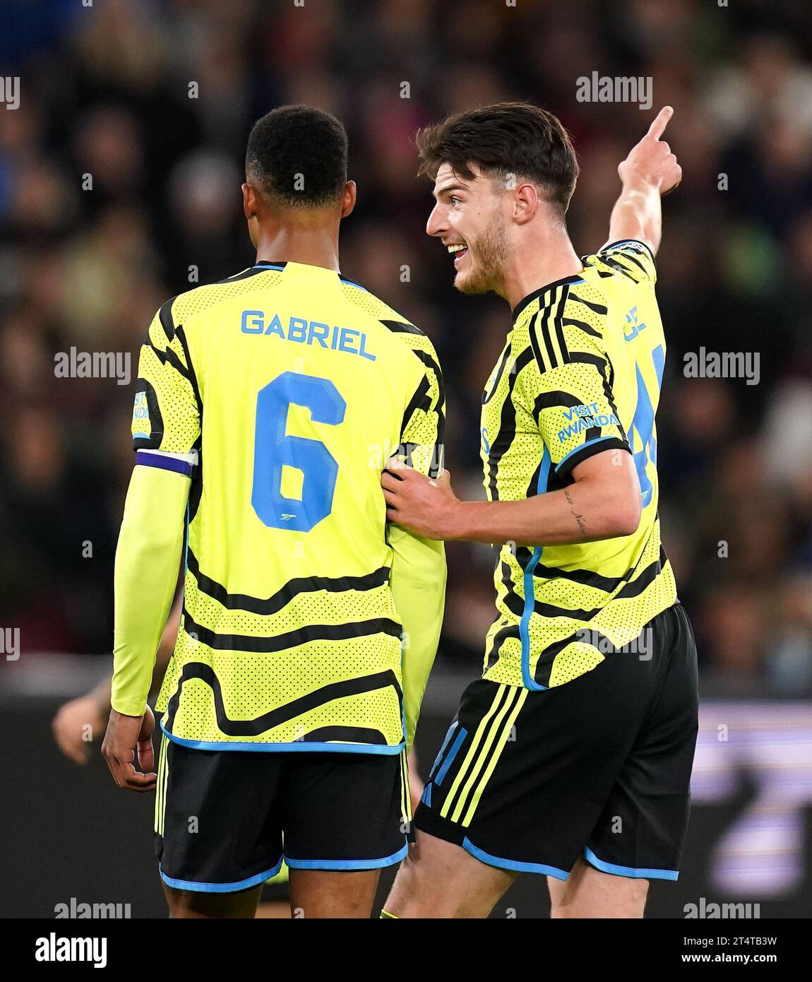 Arsenal's Declan Rice (right) speaks to team-mate Gabriel during the ...