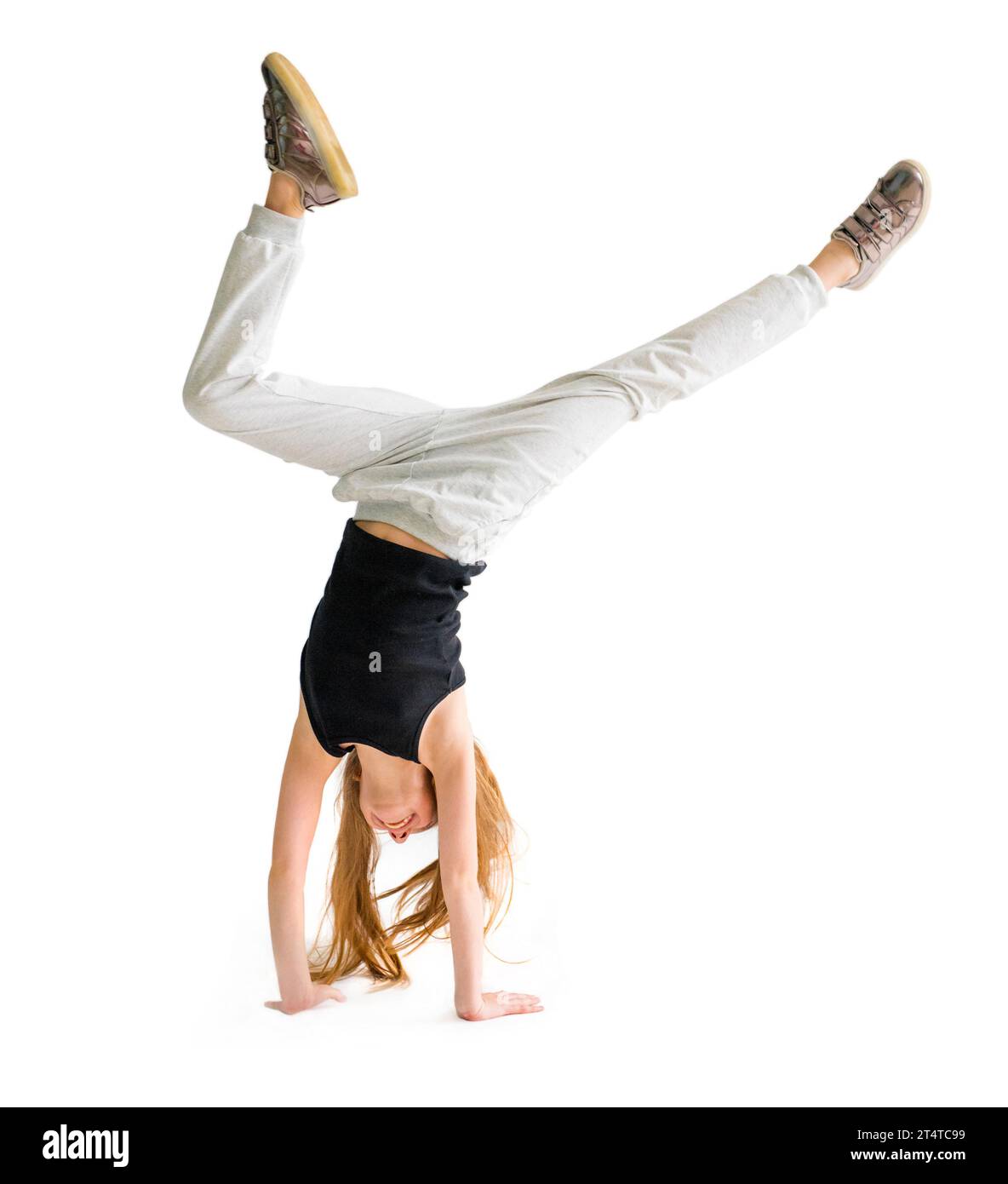 Teen girl doing handstand hi-res stock photography and images - Alamy