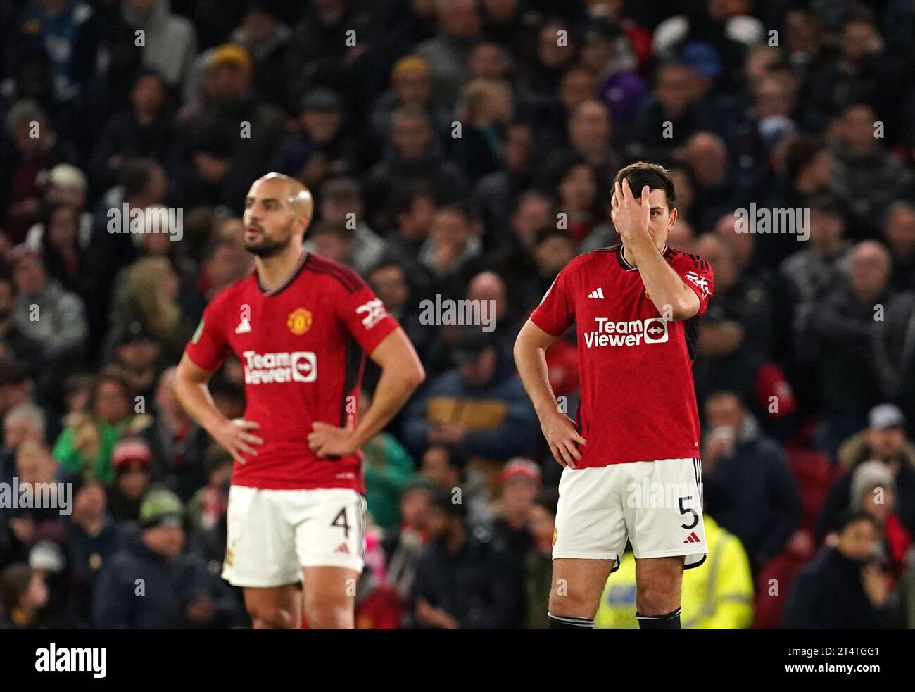 Manchester United's Sofyan Amrabat and Harry Maguire reacts after Newcastle United's Joe Willock ...