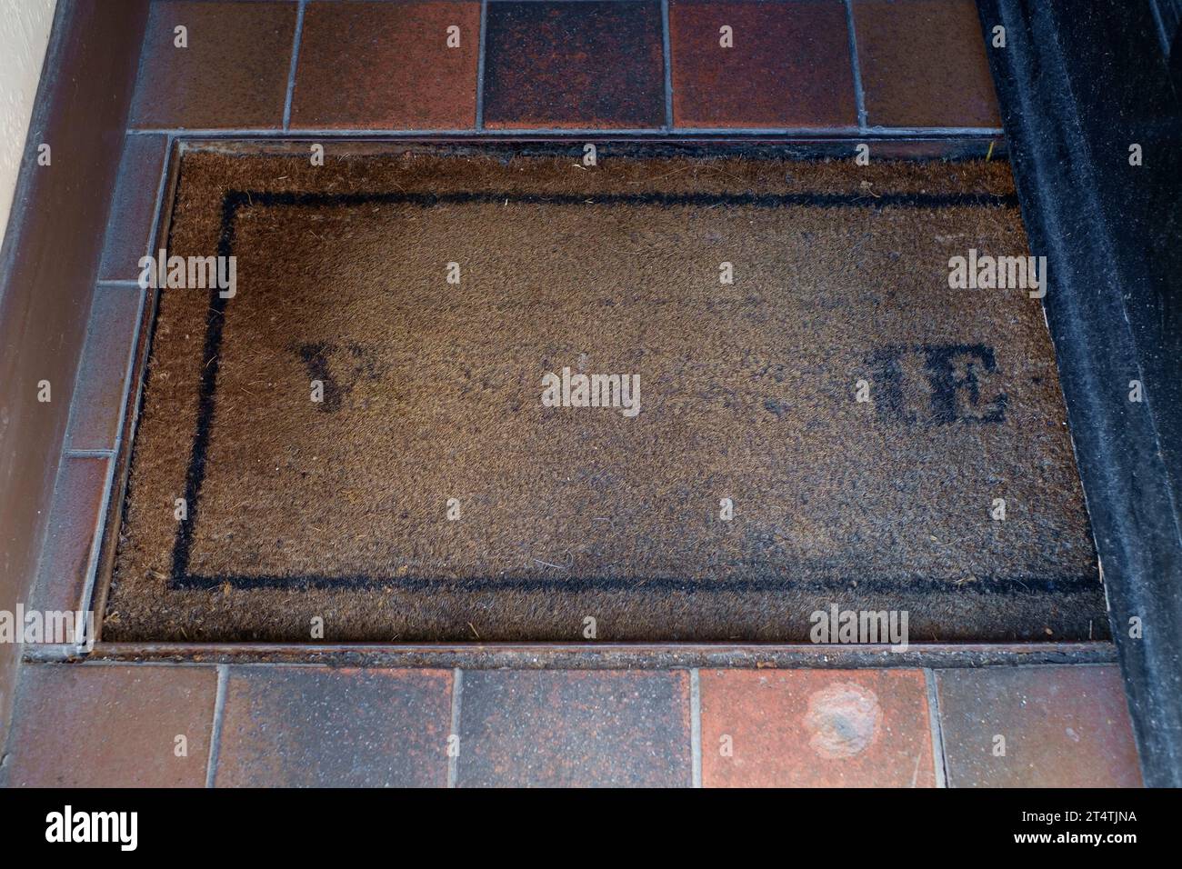 old heavily used bristle doormat in pub entrance concept worn out your ...