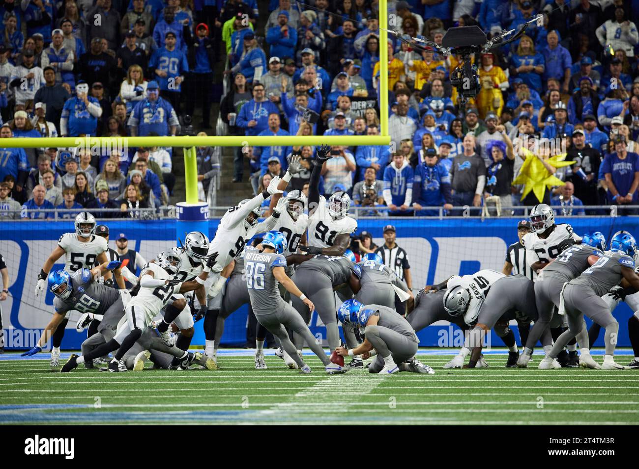 Detroit Lions place kicker Riley Patterson (36) takes a kick against ...