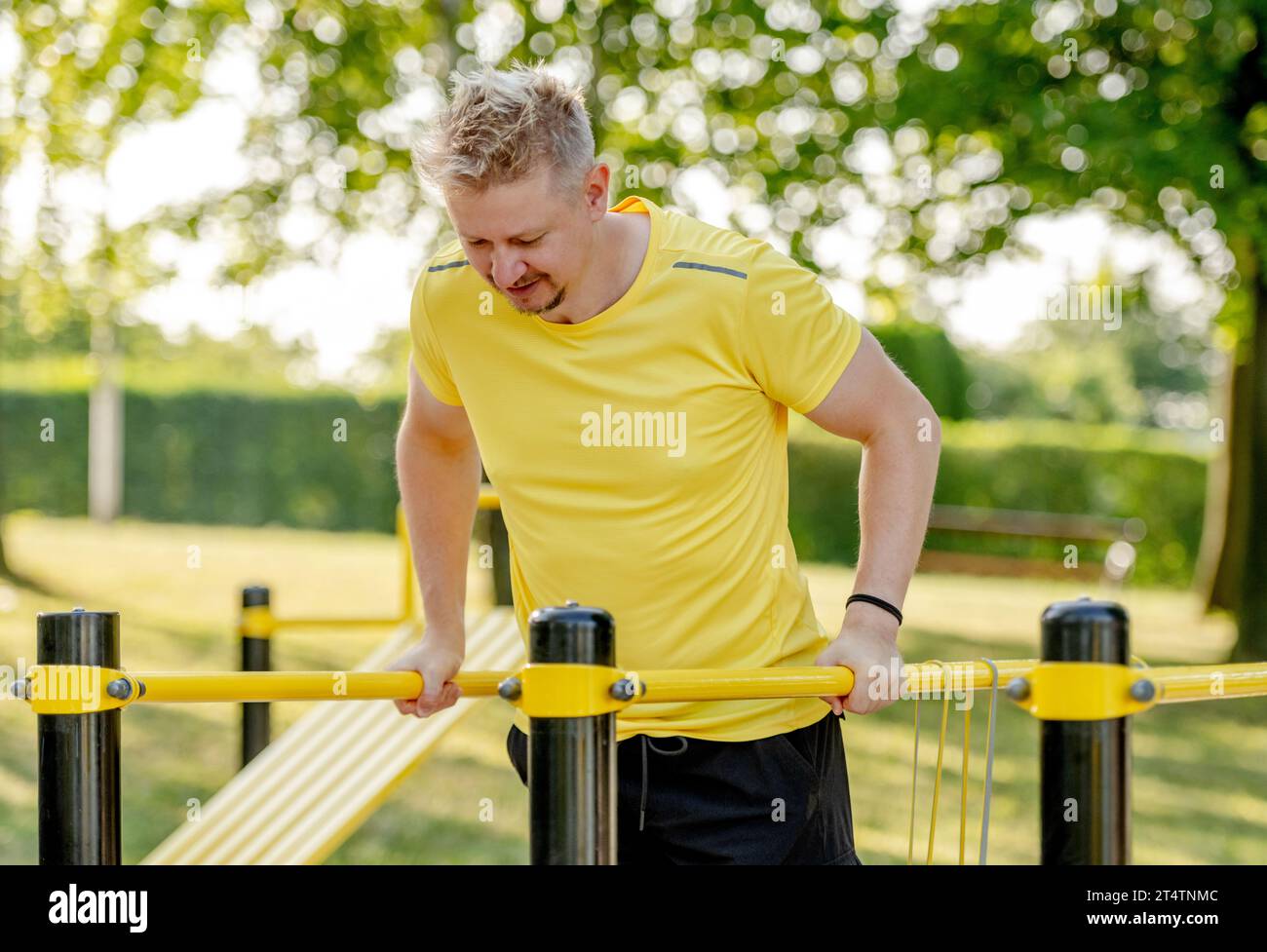 Muscular sportsman making push ups hi-res stock photography and images ...
