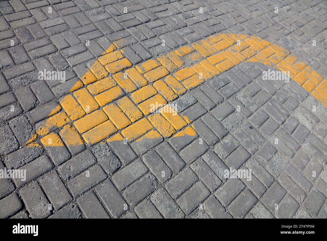 bend arrow marks on the floor tile, closeup of photo Stock Photo - Alamy