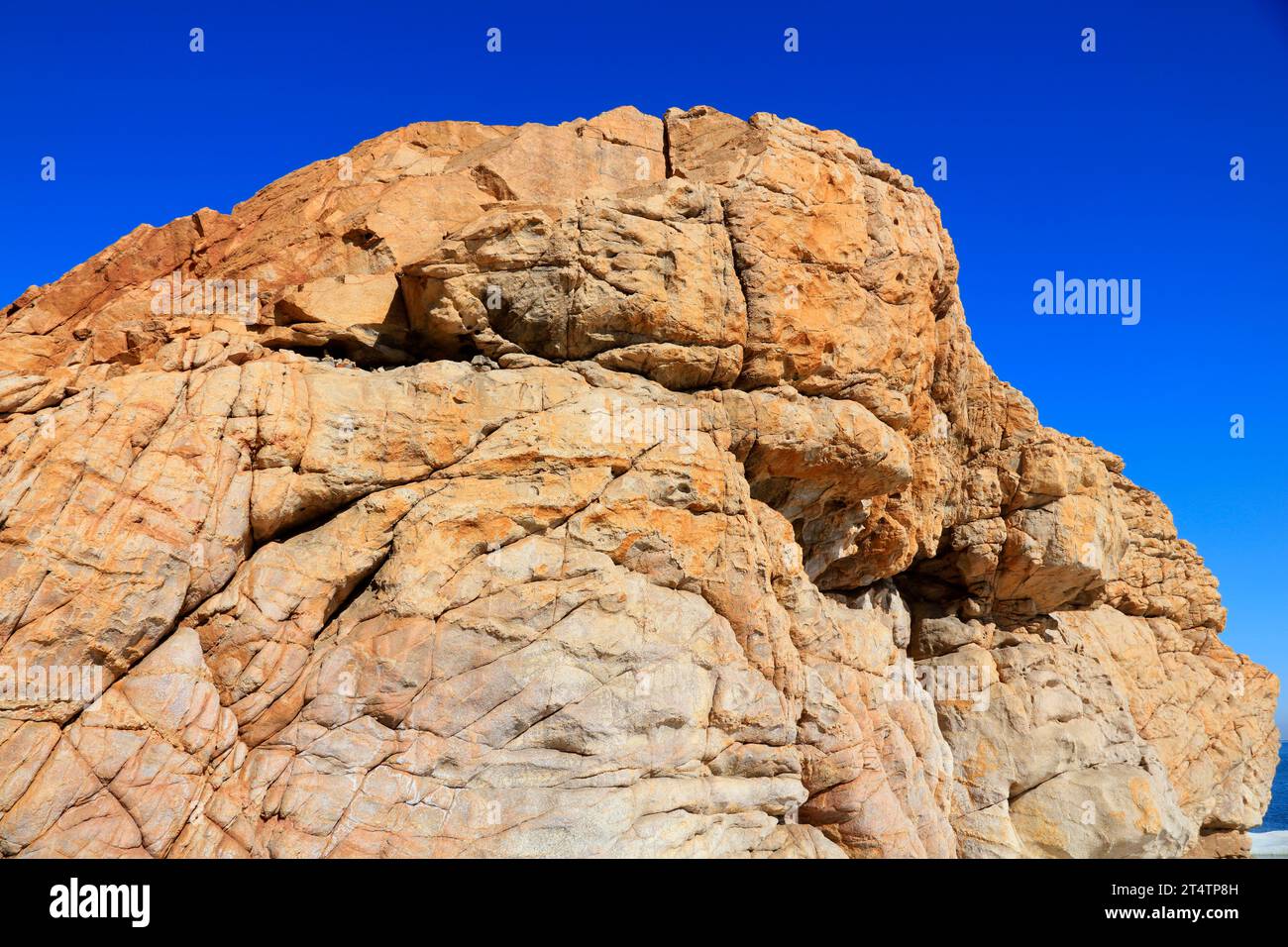 Rocks under the blue sky, closeup of photo Stock Photo - Alamy