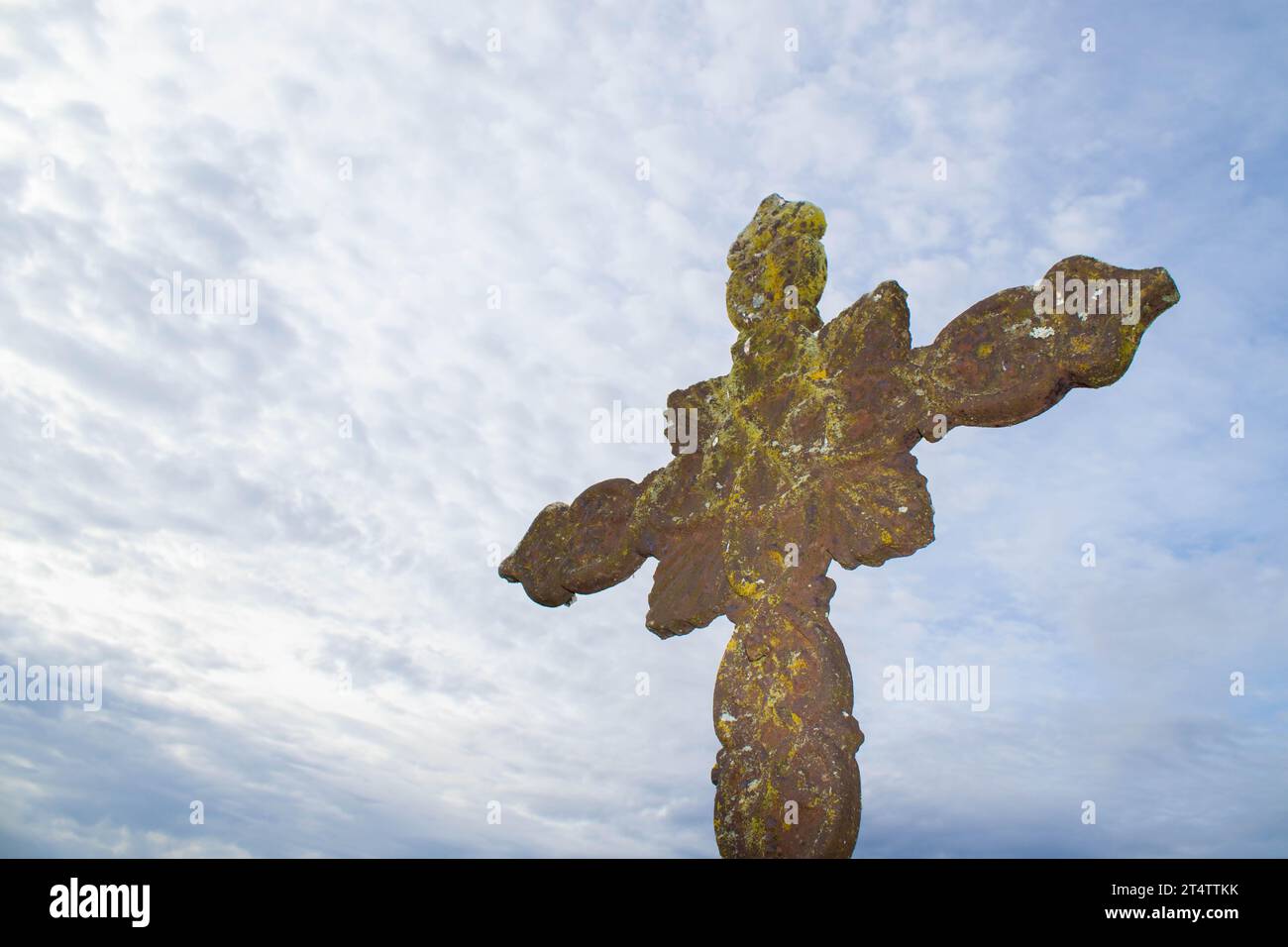 Big metal christian cross high in the blue sky. Symbol of love for ...