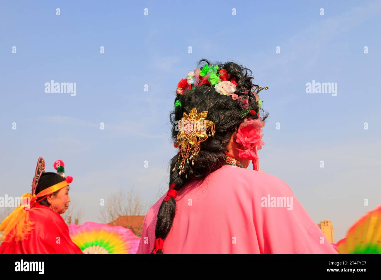 Chinese traditional style yangko folk dance performance in the street ...