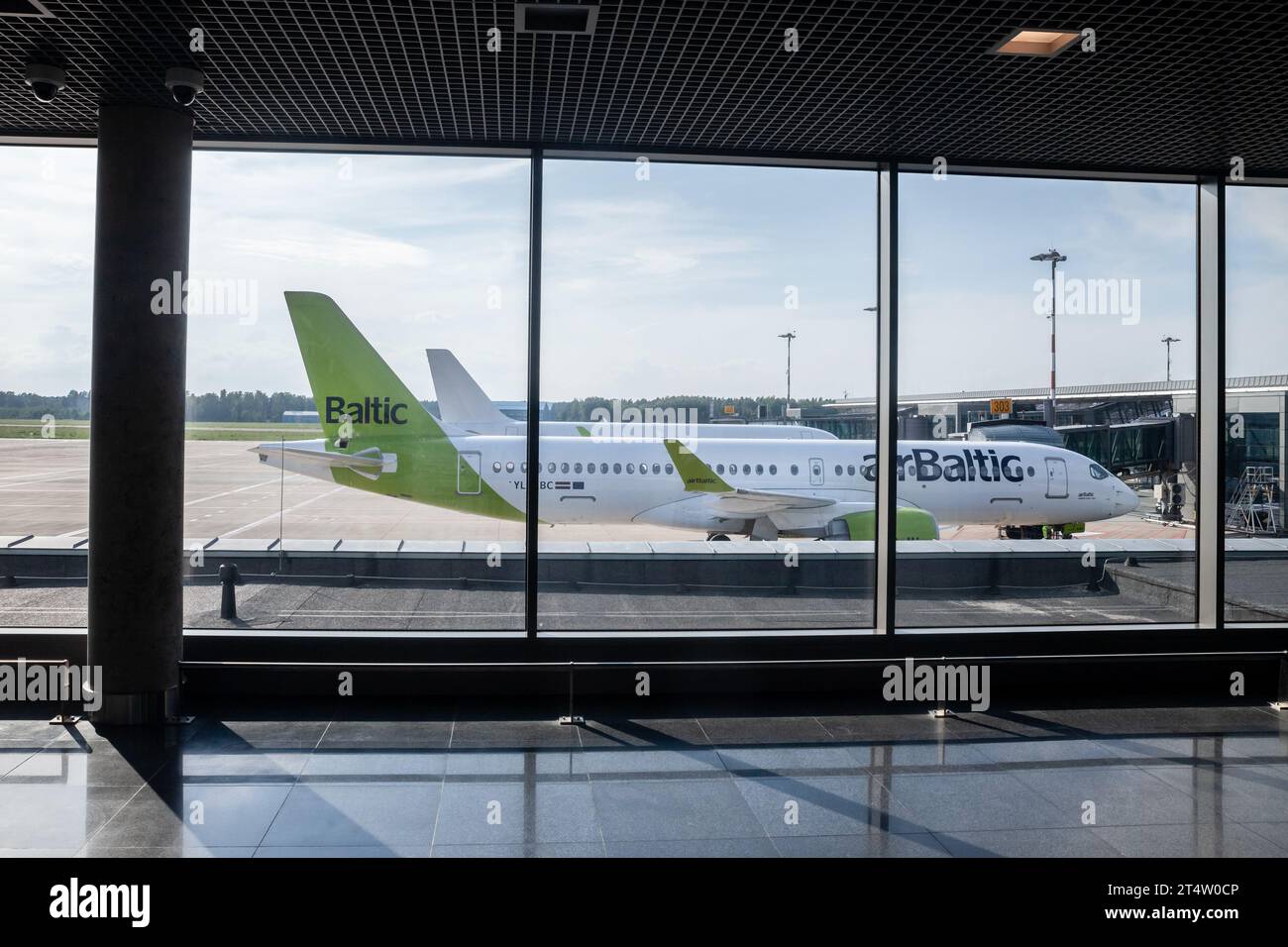 Picture of an Airbus A220 Air Baltic waiting for departure in Riga ...