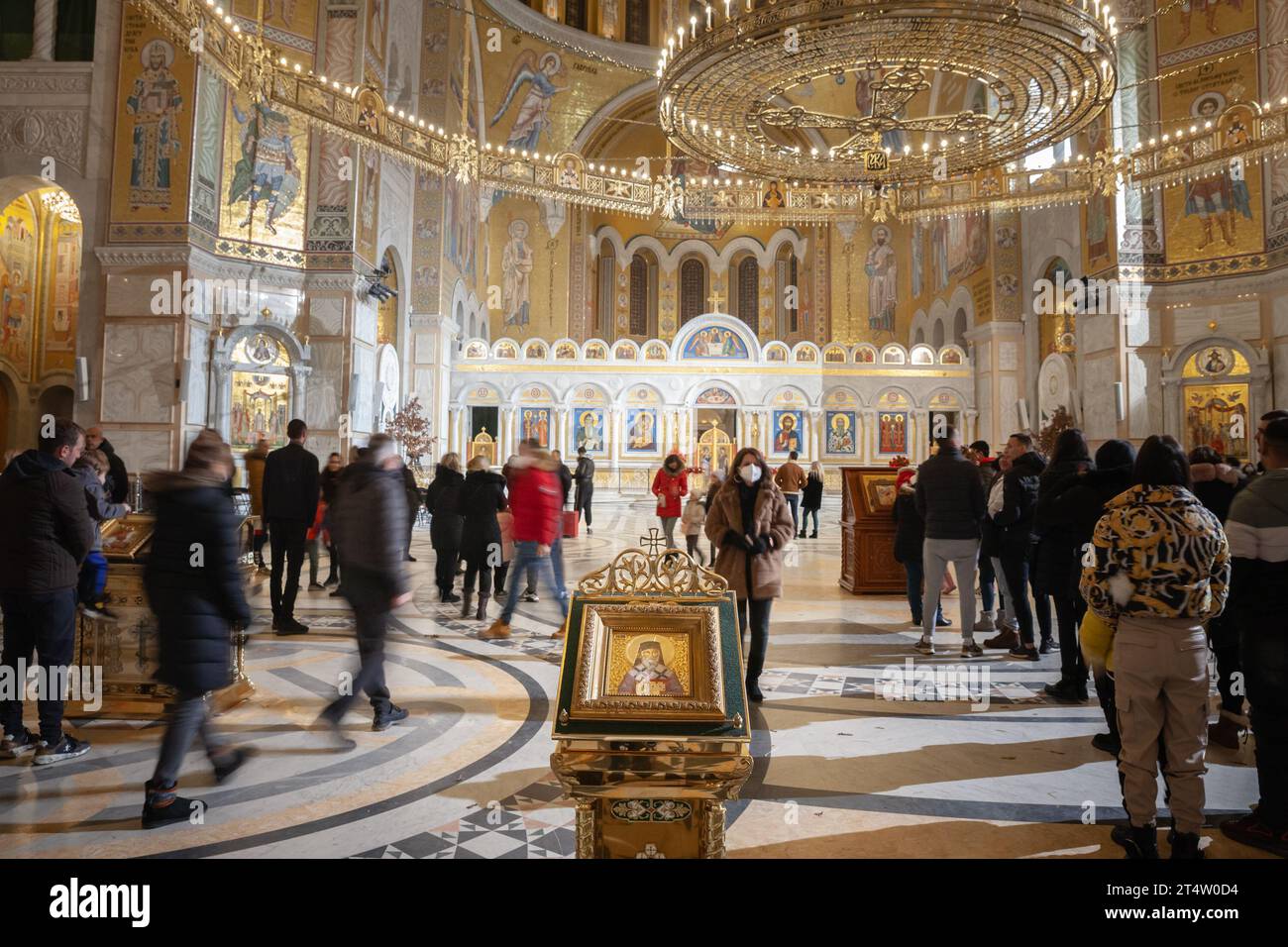 Picture of the altar of the Sveti Sava temple with people praying in ...