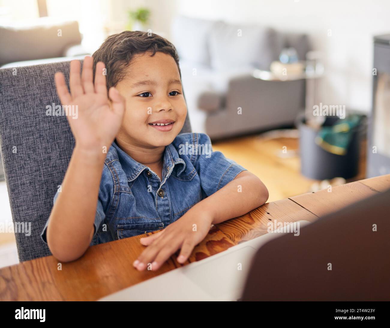 Happy boy, laptop and waving in video call for elearning, education or ...