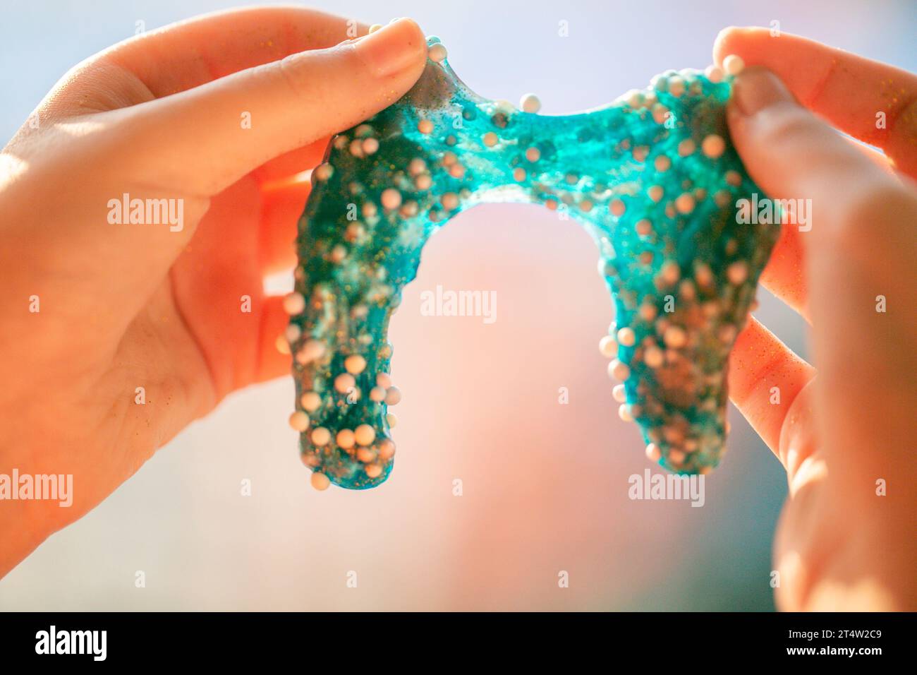 Hands green slime close up hi-res stock photography and images - Alamy