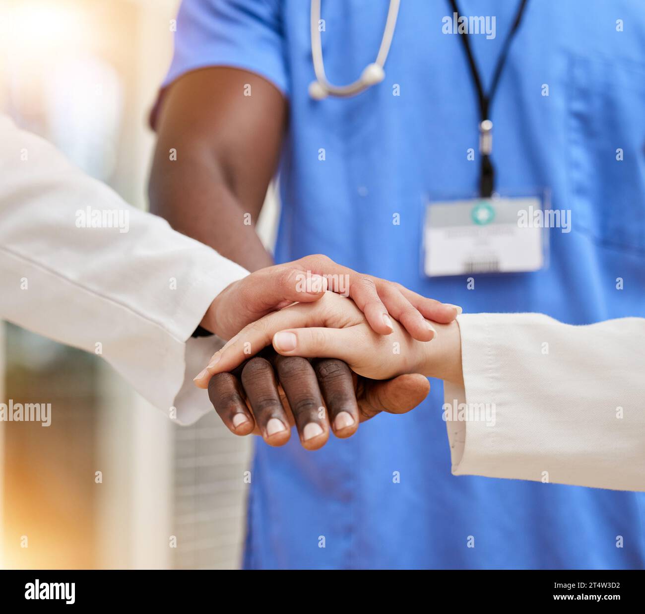 Doctors, teamwork and hands together for support, collaboration and healthcare motivation, goals ...