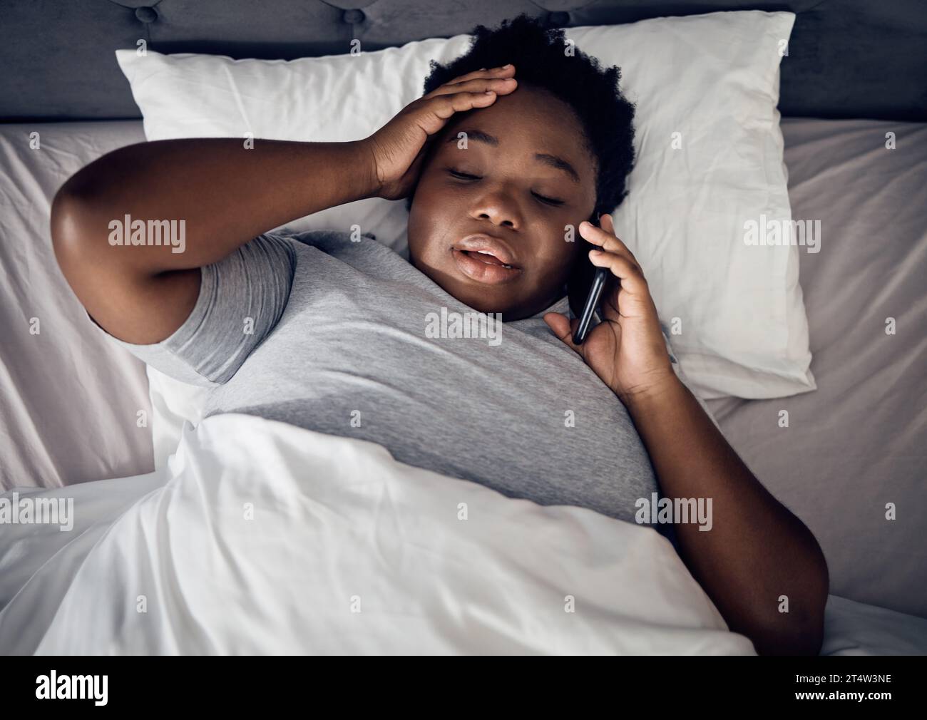 Night call in bed hi-res stock photography and images - Alamy