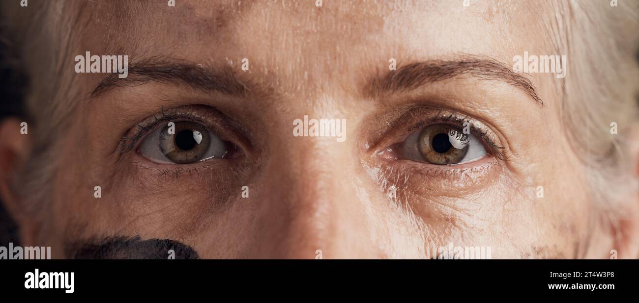 Senior woman, eyes and closeup with crying, portrait and sad with ...