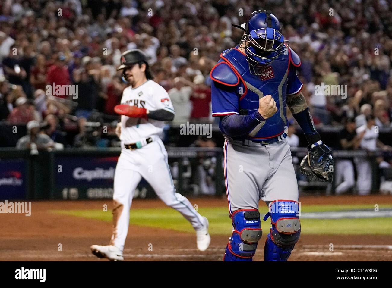 Texas Rangers catcher Jonah Heim celebrates the last out against the ...