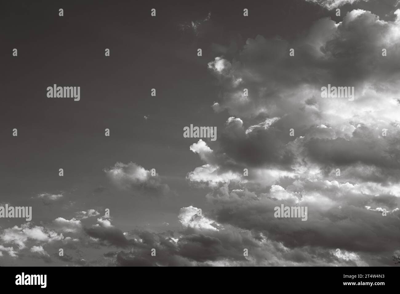 Epic cloudscape with emerging sun rays Stock Photo - Alamy