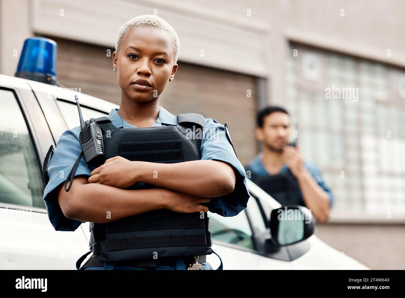 Black woman, police and arms crossed in city for law enforcement ...