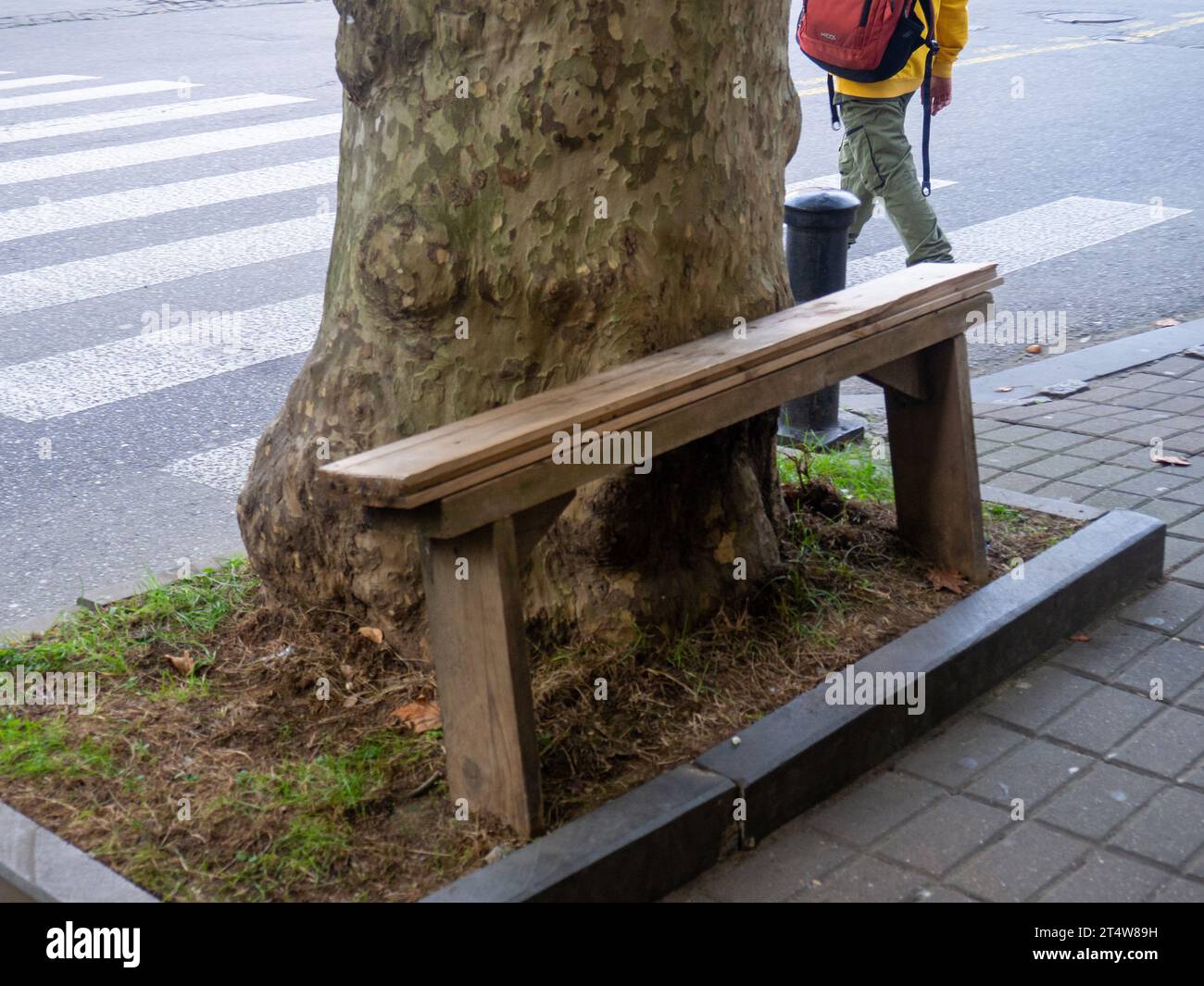 A rickety bench on the street. Seat for people. Poor infrastructure ...