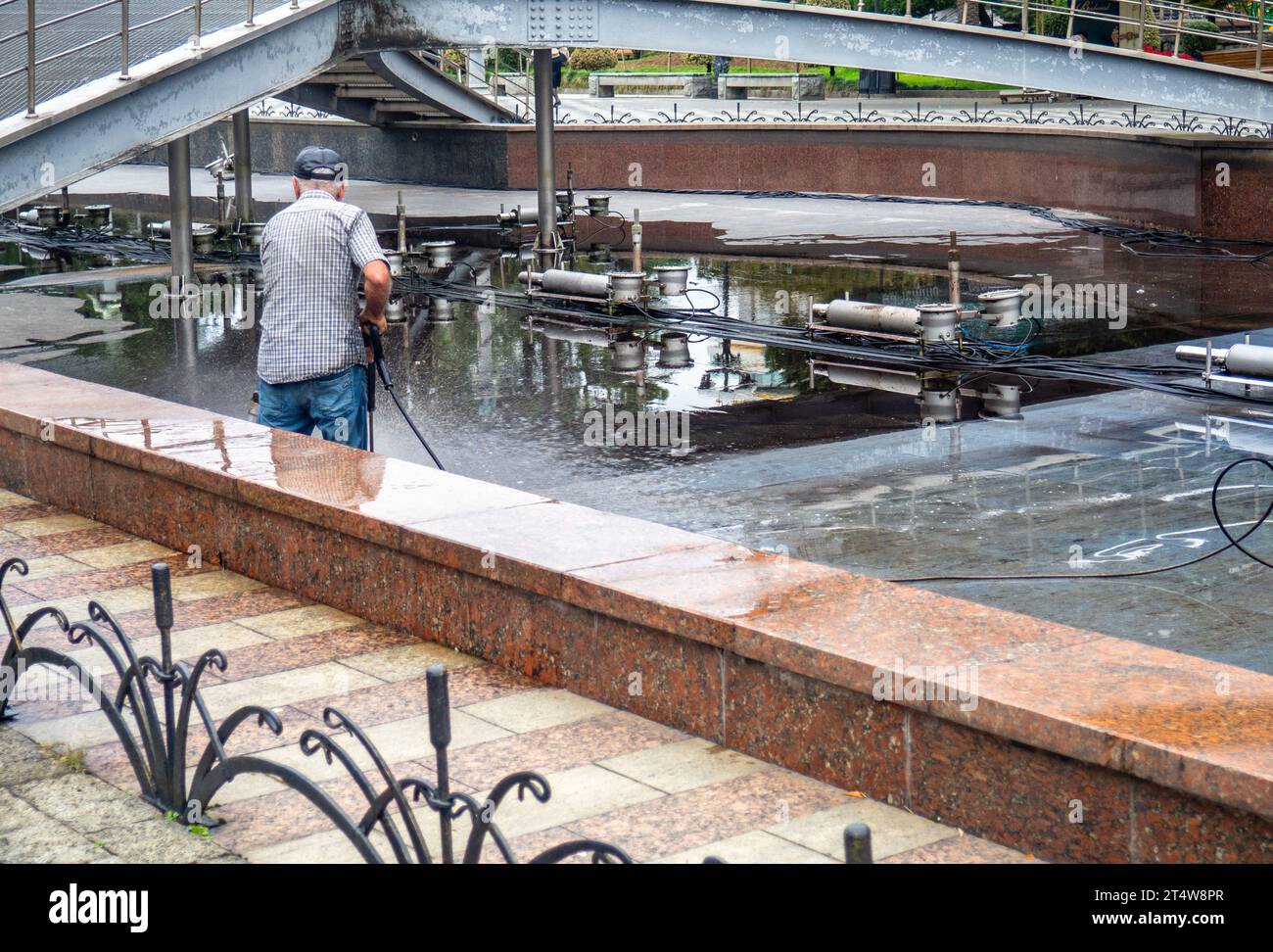 Empty fountain in a city park. Draining the fountain. Cleaning the ...