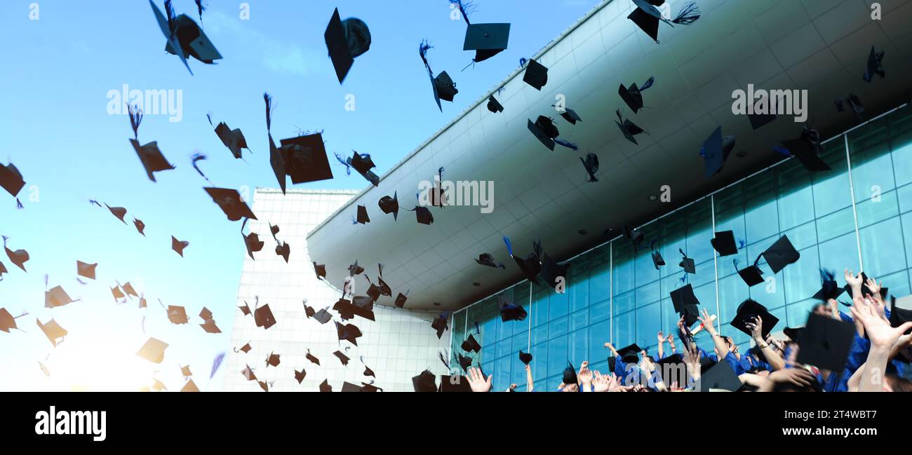 Graduation cap throwing hands hi-res stock photography and images - Alamy