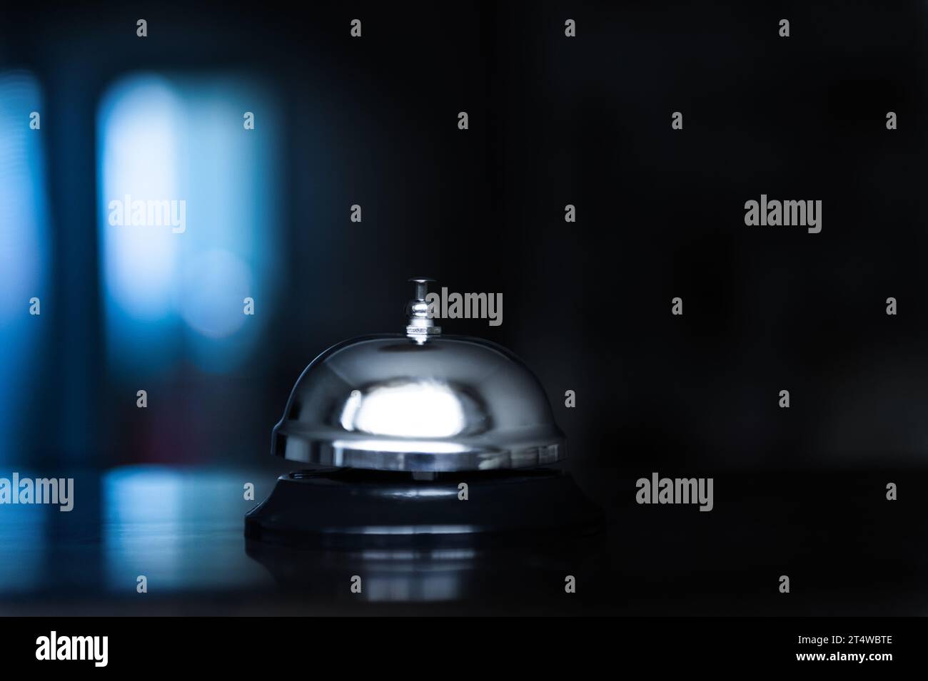 Bell on counter for service Stock Photo - Alamy