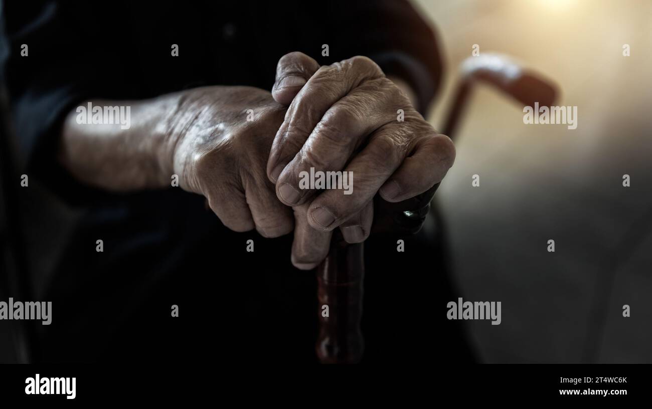 Old chinese man walking stick hi-res stock photography and images - Alamy