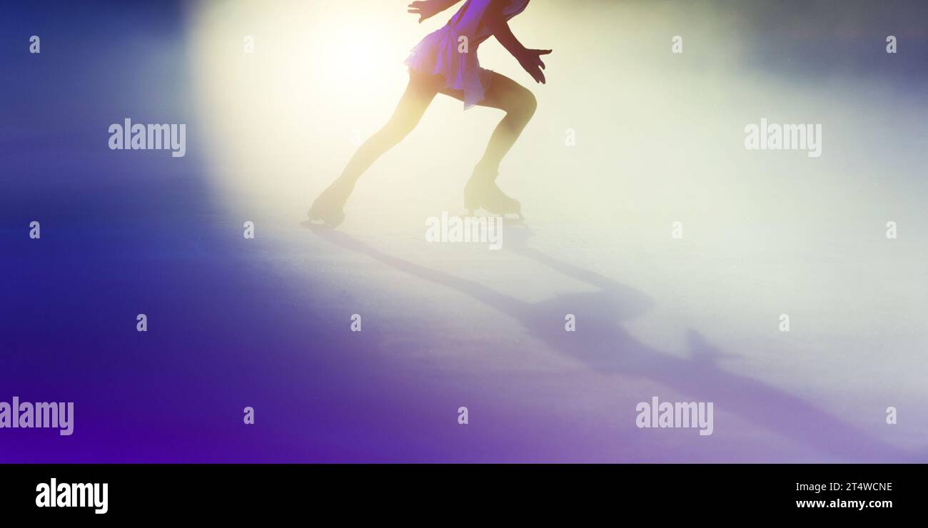 Young girl ice figure skating with beautiful light effect Stock Photo ...