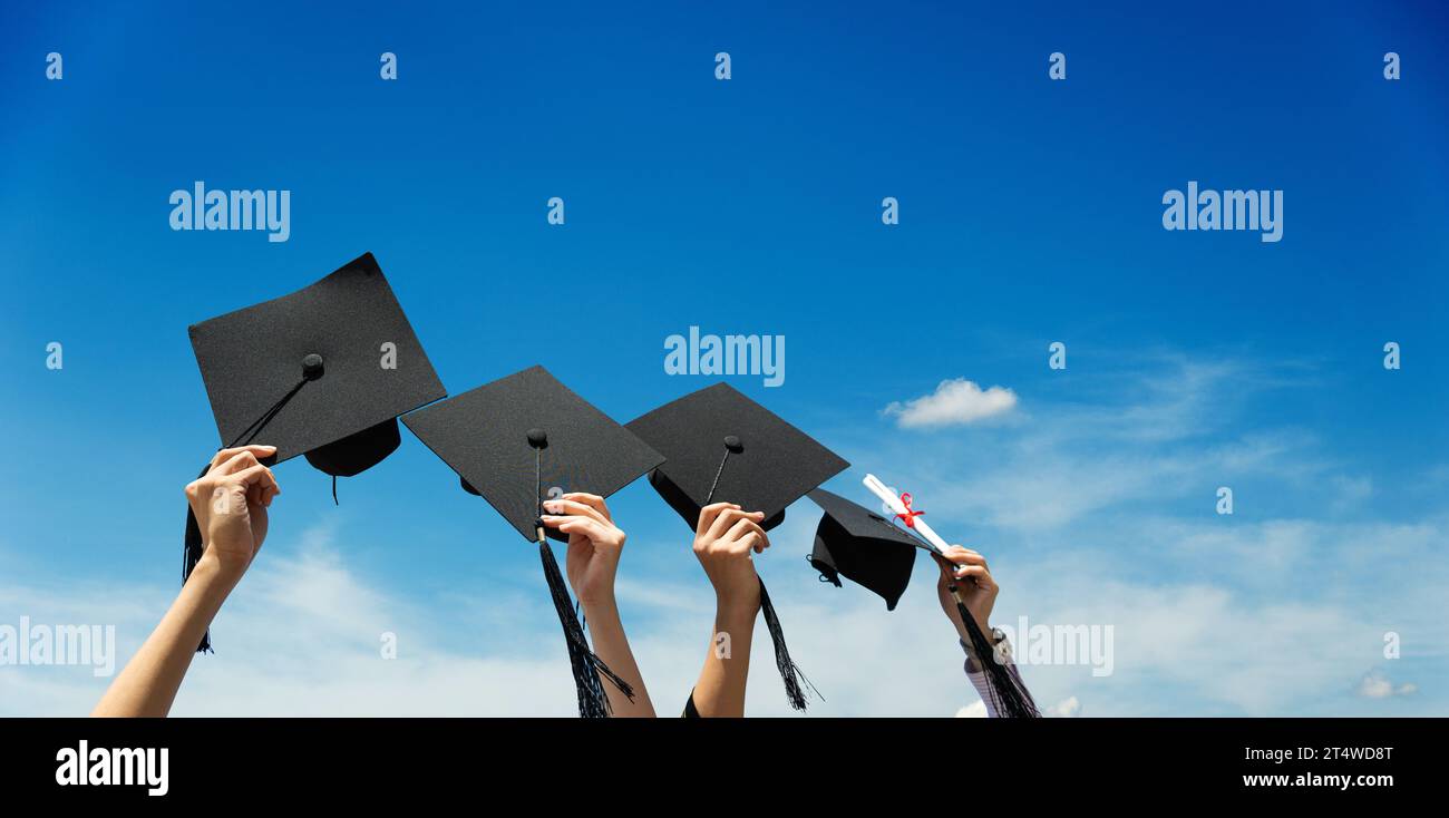 Graduation cap throwing hands hi-res stock photography and images - Alamy