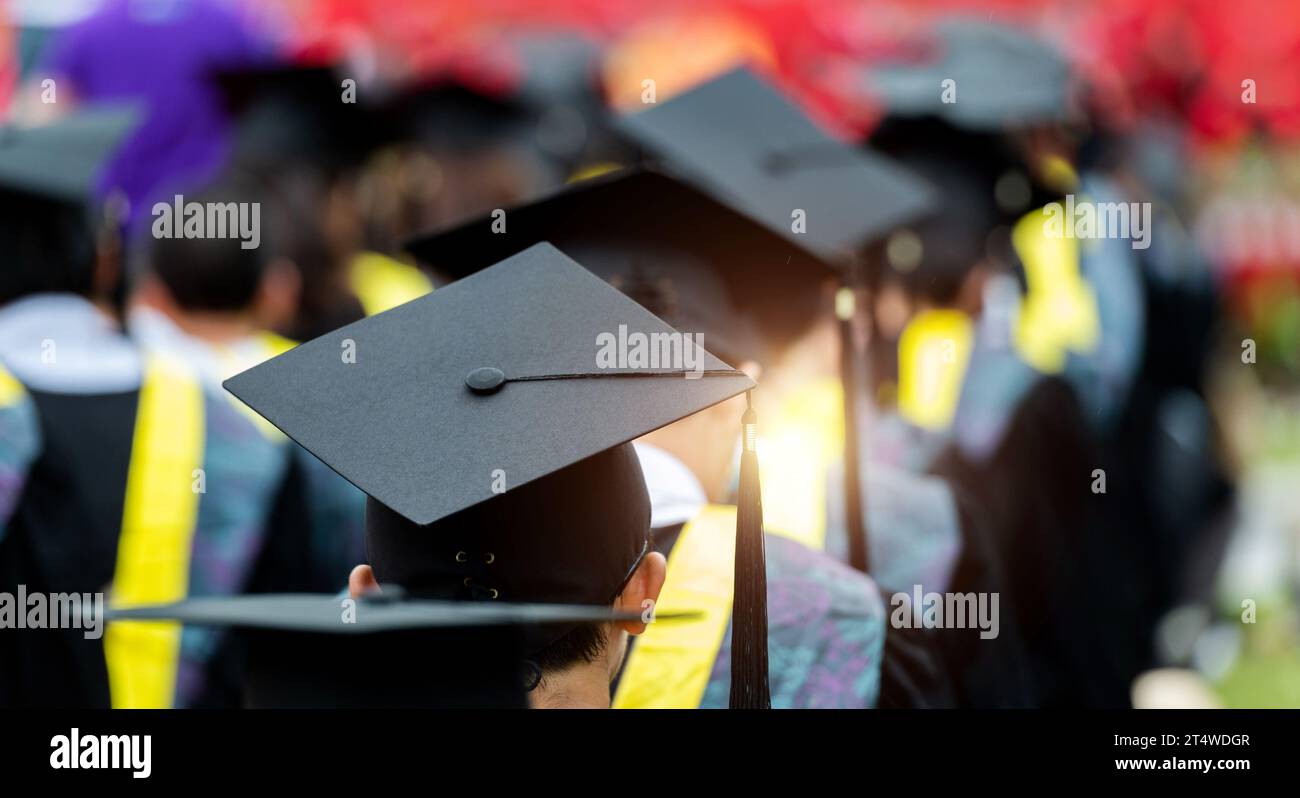 Back view of graduates during commencement Stock Photo - Alamy