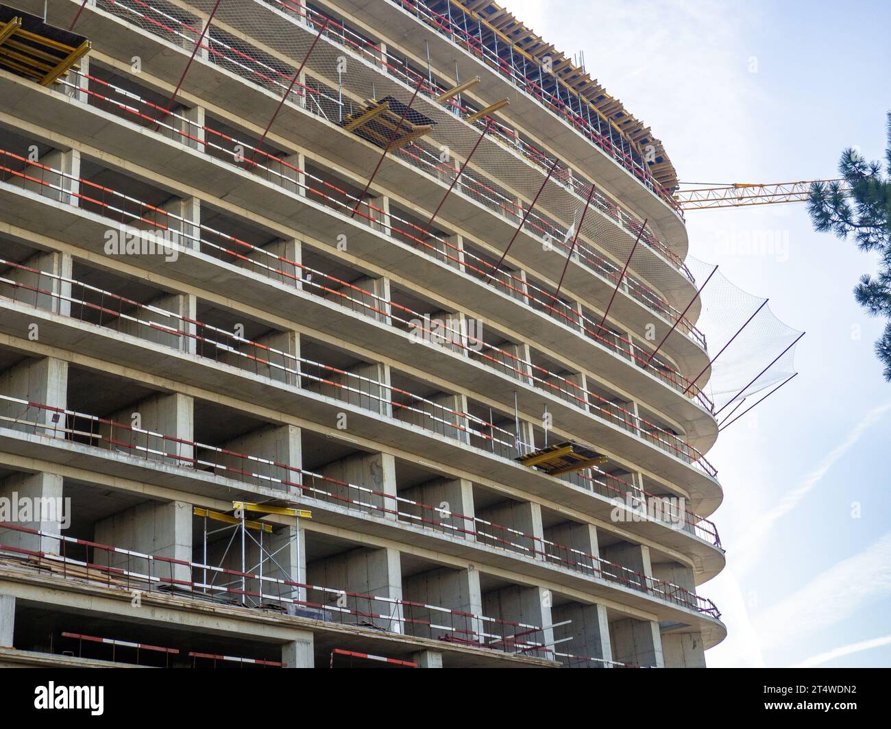 Construction of a modern high-rise building. Sides on the floors ...