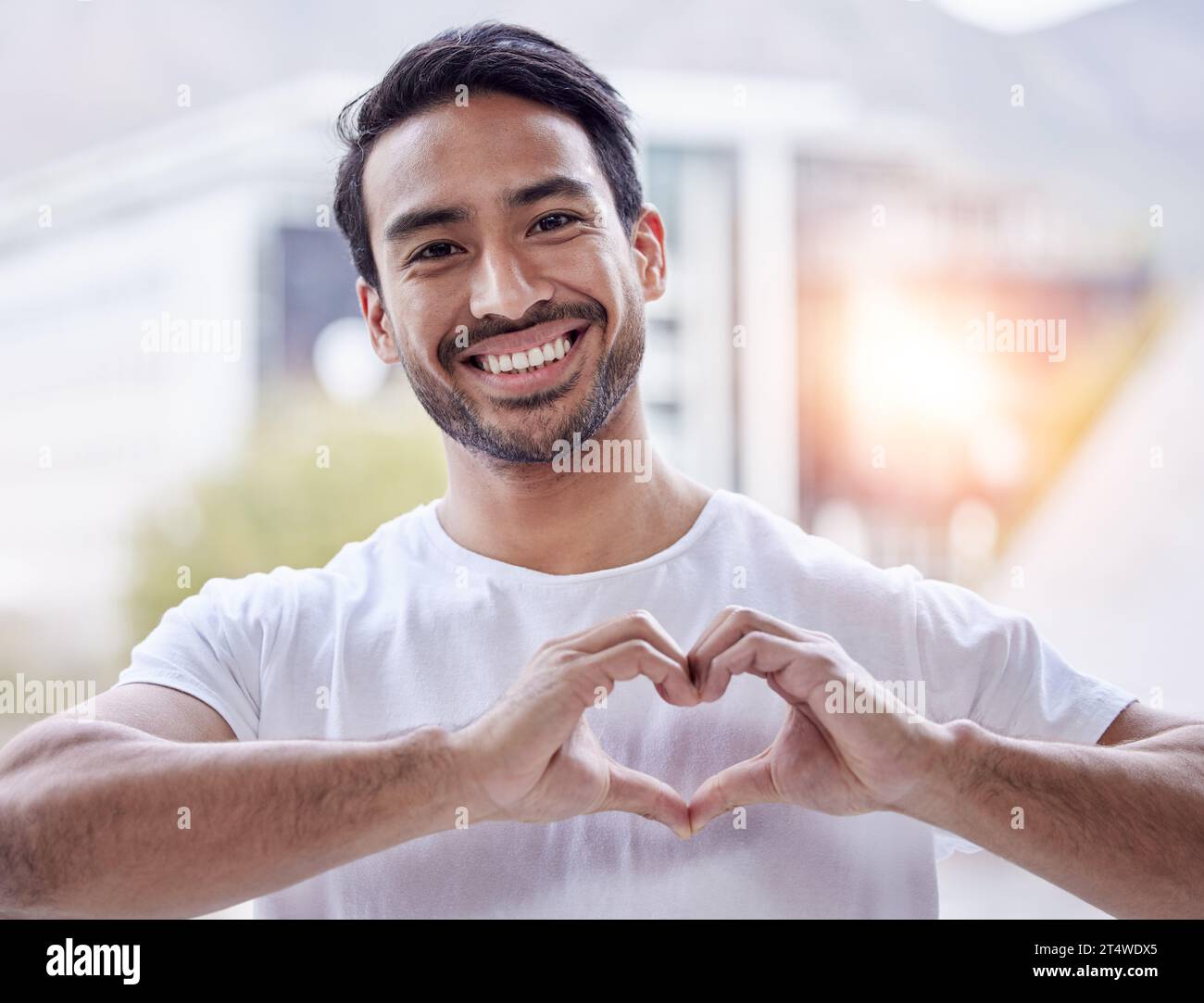 Portrait, smile and Asian man with heart sign, support and review with ...
