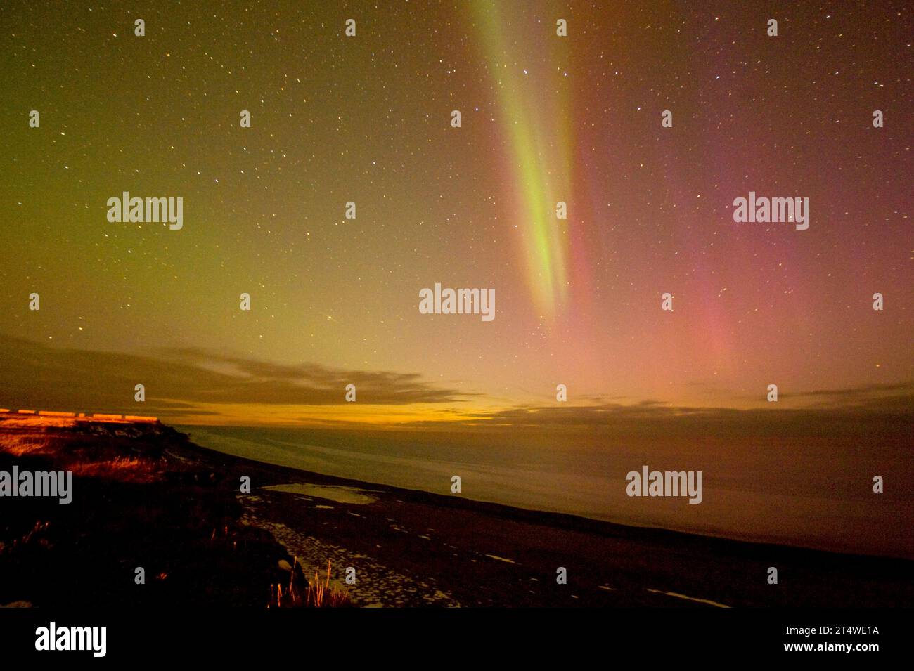 Northern lights Aurora borealis glow brightly and shoot across the ...