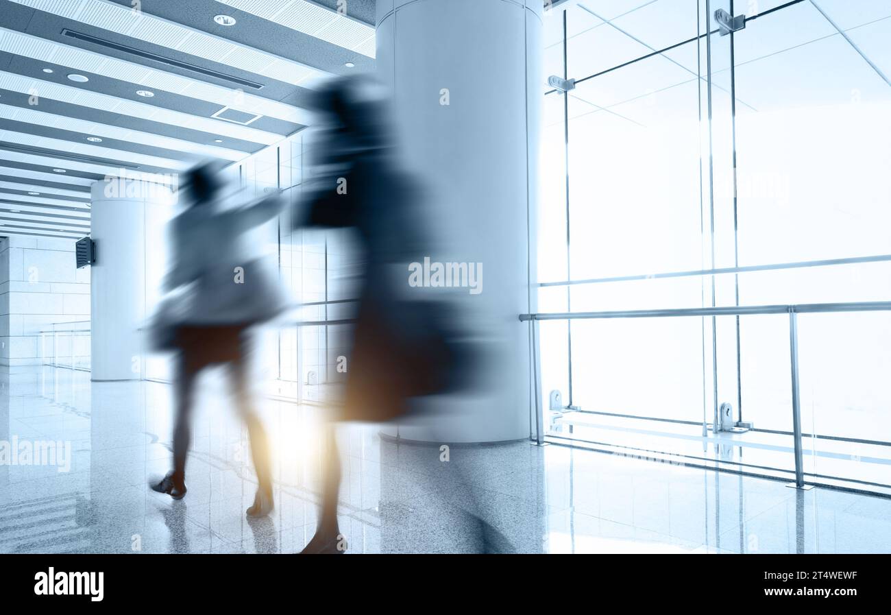 Perspective of the passage and people in motion blur Stock Photo - Alamy