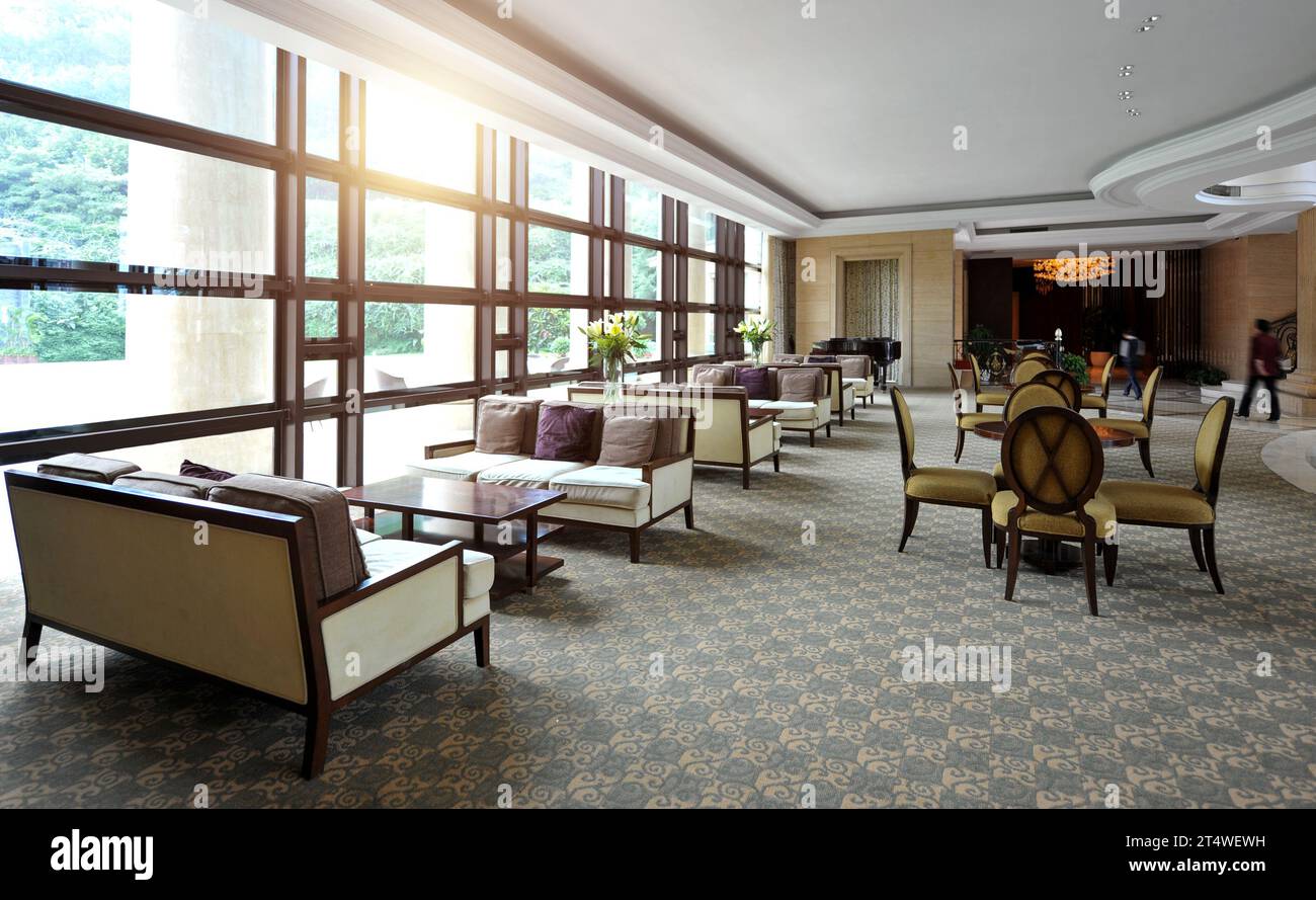 Modern office bar with chairs, sofa and table Stock Photo - Alamy