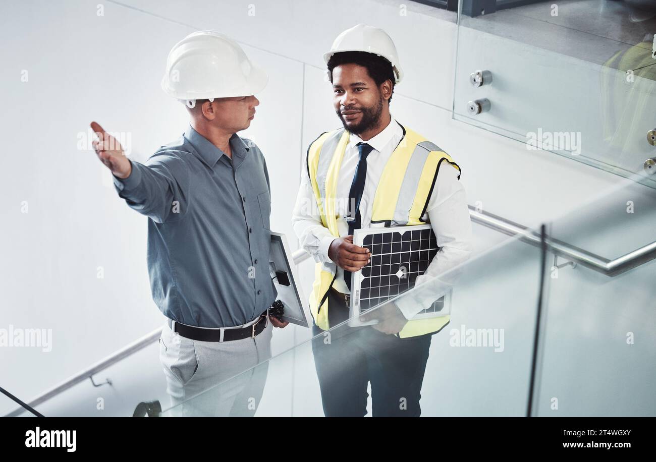 Engineer, electrician or team talking energy for construction project ...