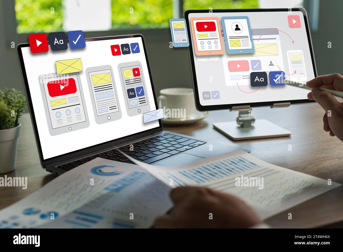 Team designers work on UI and UX designs for mobile app technology ...