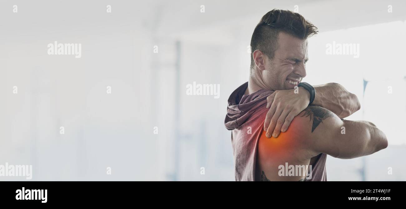 Man, training and shoulder pain with mockup space at gym for workout ...