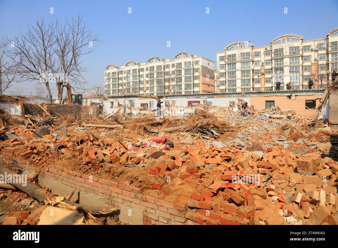 Tangshan City - March 14, 2016: people were busy cleaning up demolished ...