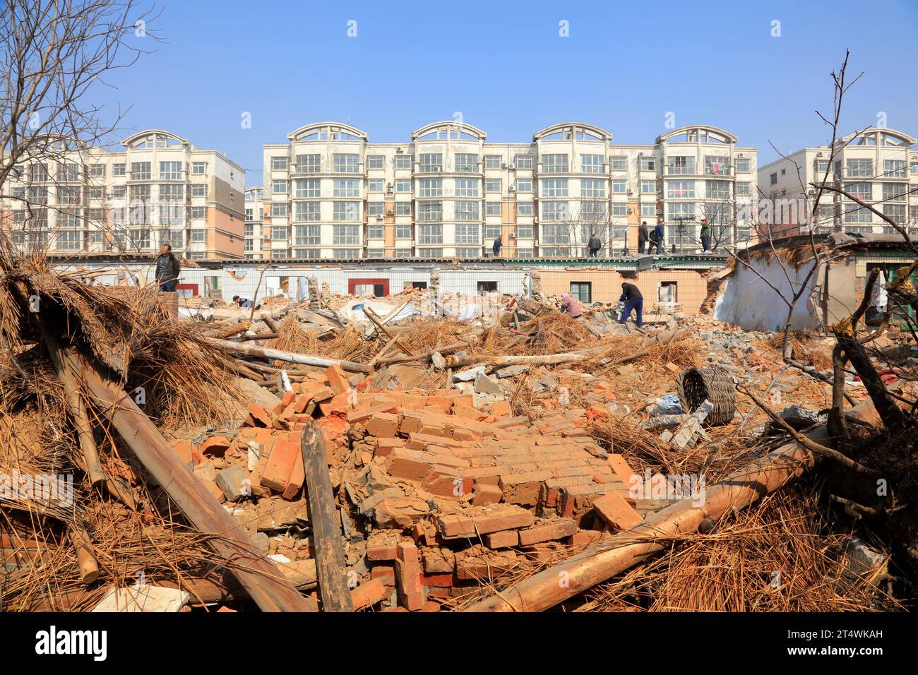 Tangshan City - March 14, 2016: people were busy cleaning up demolished ...