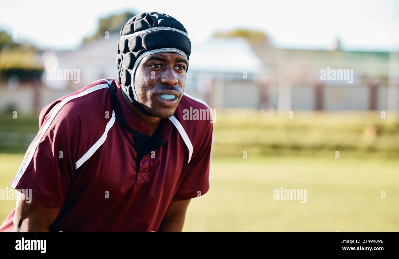 Sports, rugby and black man athlete on field playing or training for a ...
